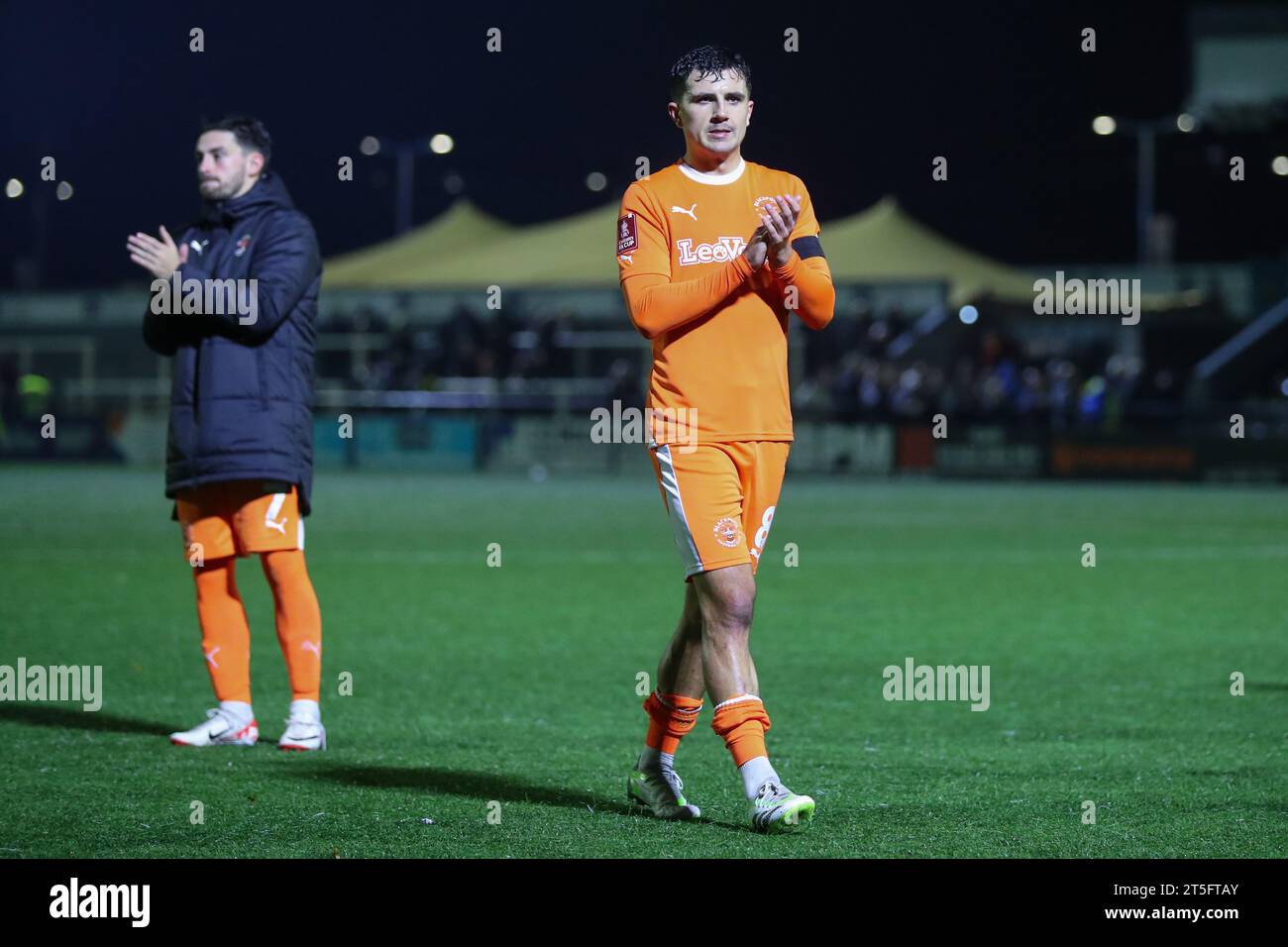 Albie Morgan #8 of Blackpool applauds the travelling fans after the ...