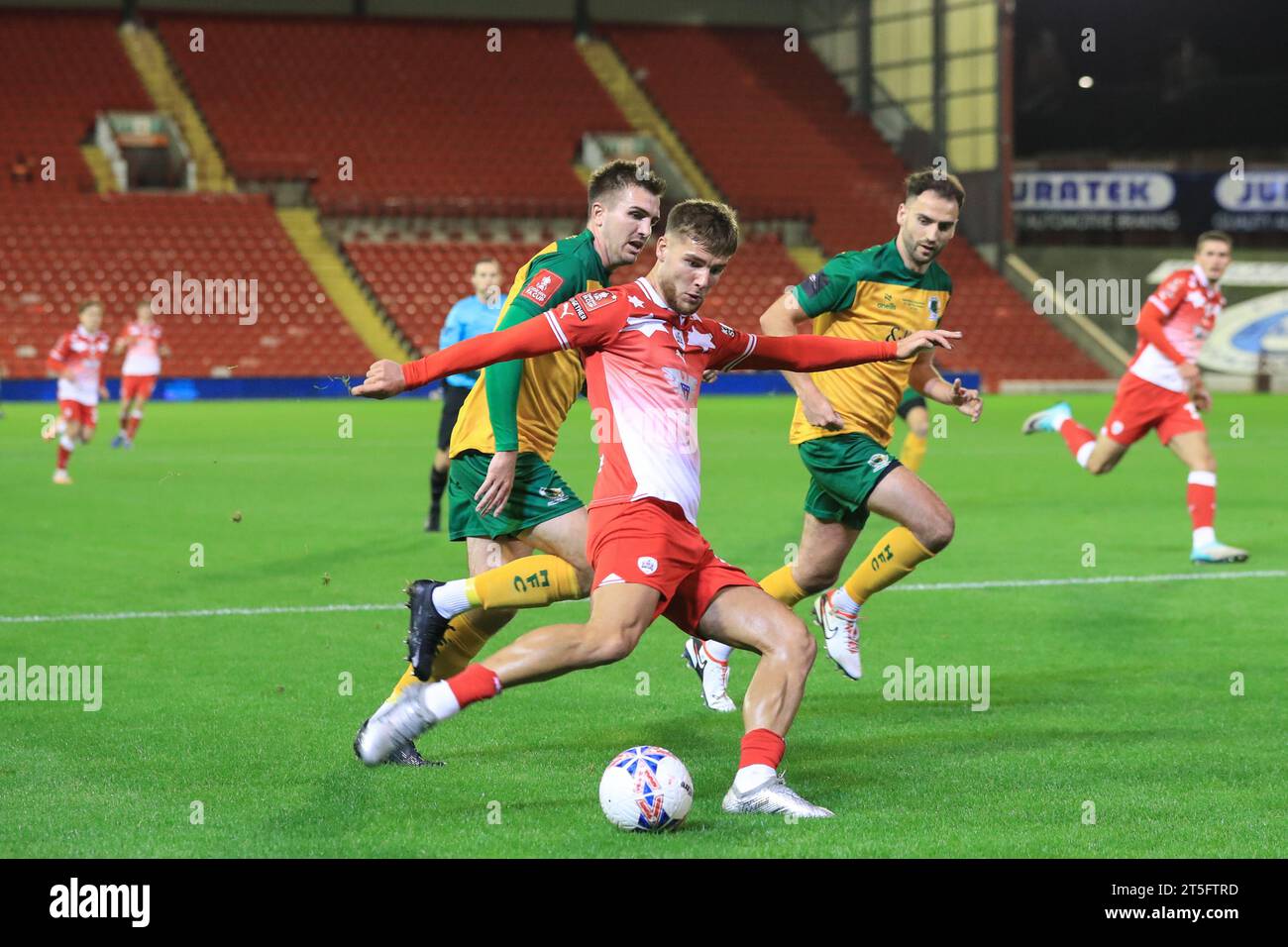 John Mcatee #45 of Barnsley takes a shot on goal during the Emirates FA ...