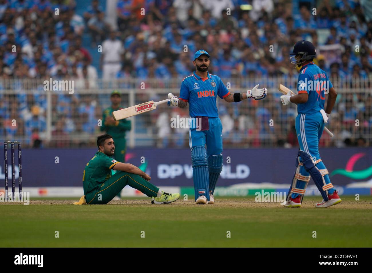 India's Virat Kohli, center, reacts as South Africa's Tabraiz Shamshi ...