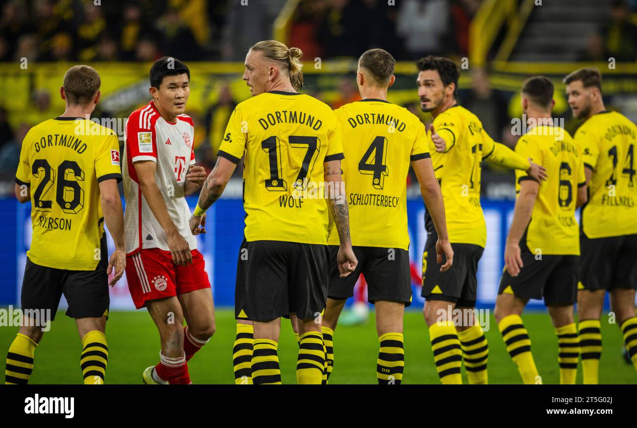 Dortmund, Germany. 04th Nov 2023. Julian Ryerson (BVB), Min-jae Kim (Muenchen), Marius Wolf (BVB ...