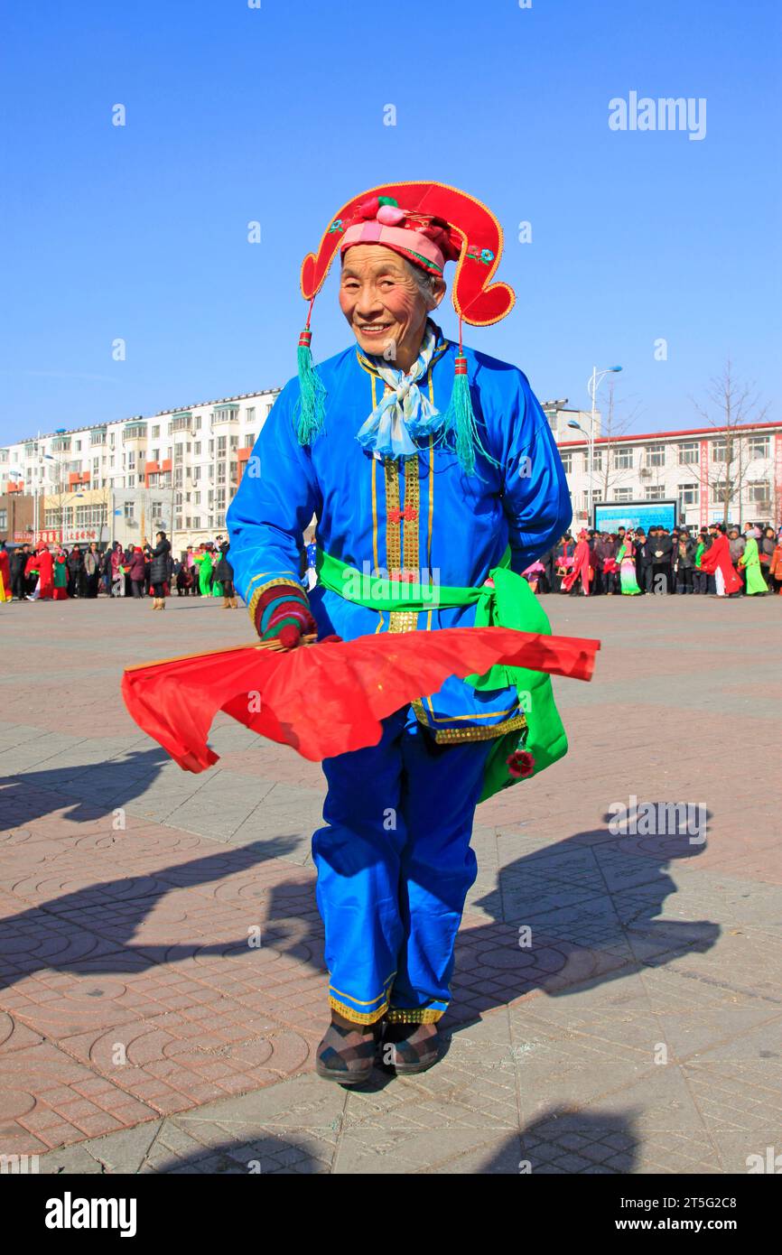 LUANNAN COUNTY - FEBRUARY 10: Old woman wearing colorful clothes ...