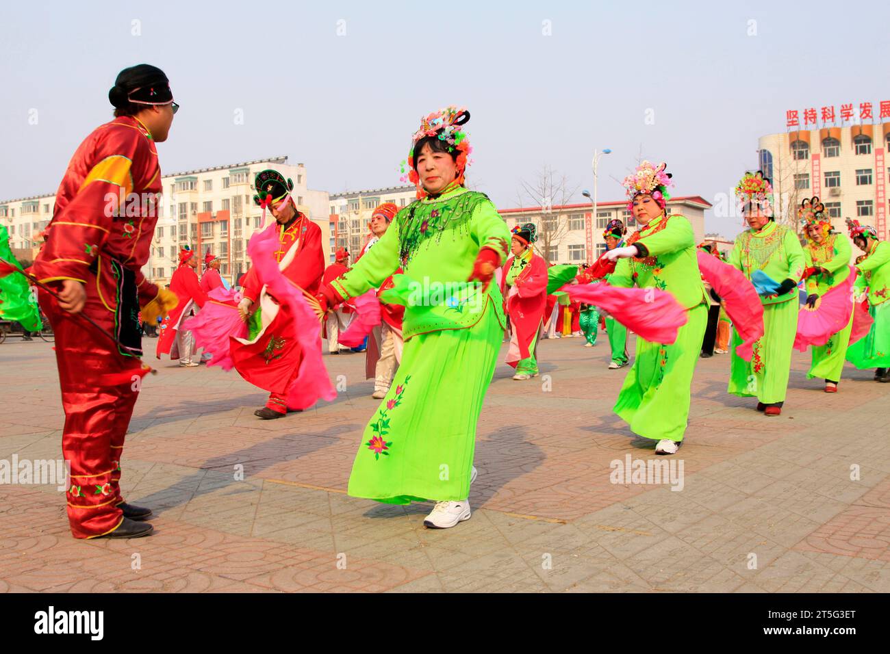 LUANNAN COUNTY - FEBRUARY 13: People wearing colorful clothes ...