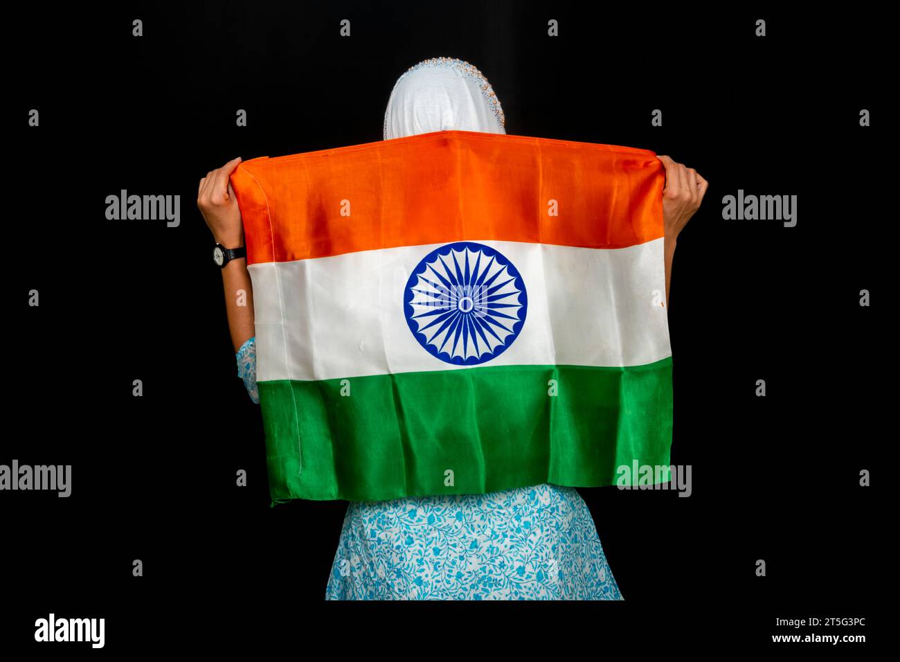 Young Indian Woman Holding Tricolor On Her Back, Flag Of India ...