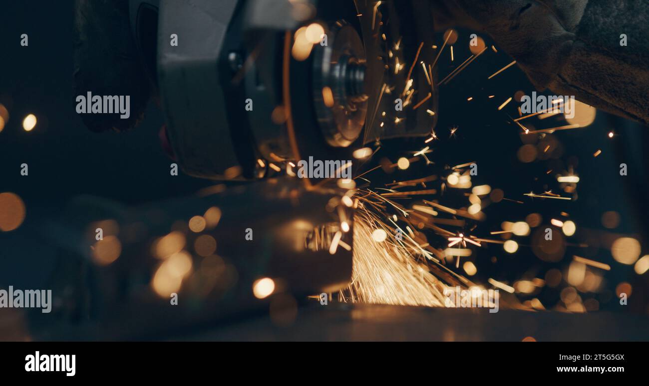 Worker Using Industrial Grinder Metalwork Industry Stock Photo - Alamy