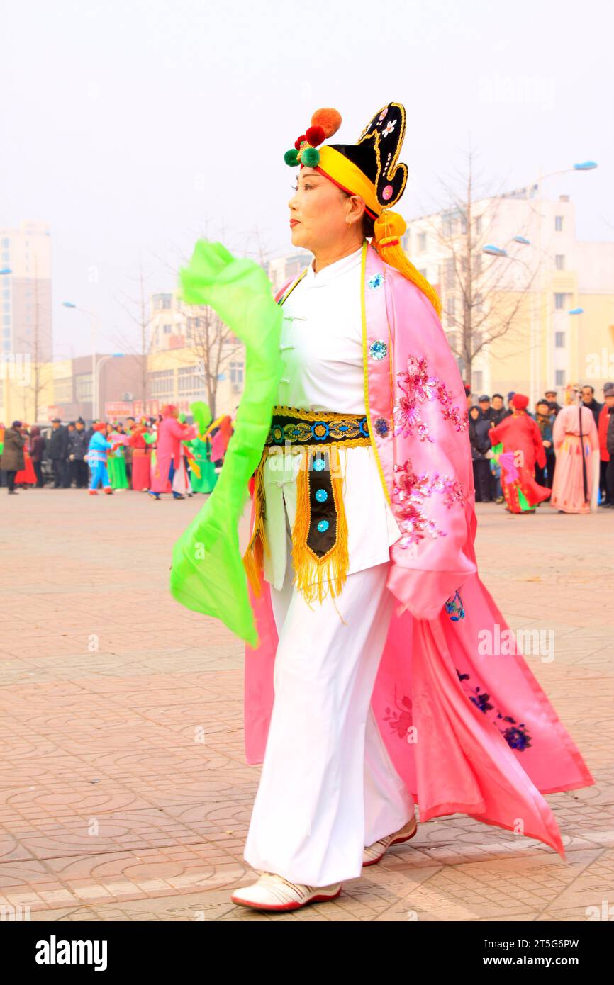 LUANNAN COUNTY - FEBRUARY 15: Performer wearing colorful clothes ...