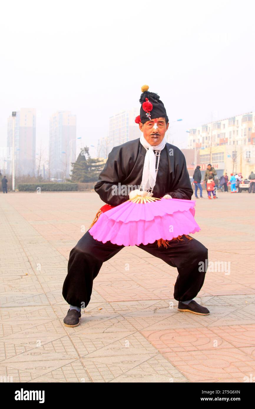 LUANNAN COUNTY - FEBRUARY 15: Buffoon wearing colorful clothes ...