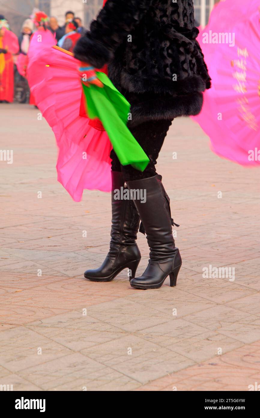 black leather boots on the playground, closeup of photo Stock Photo - Alamy