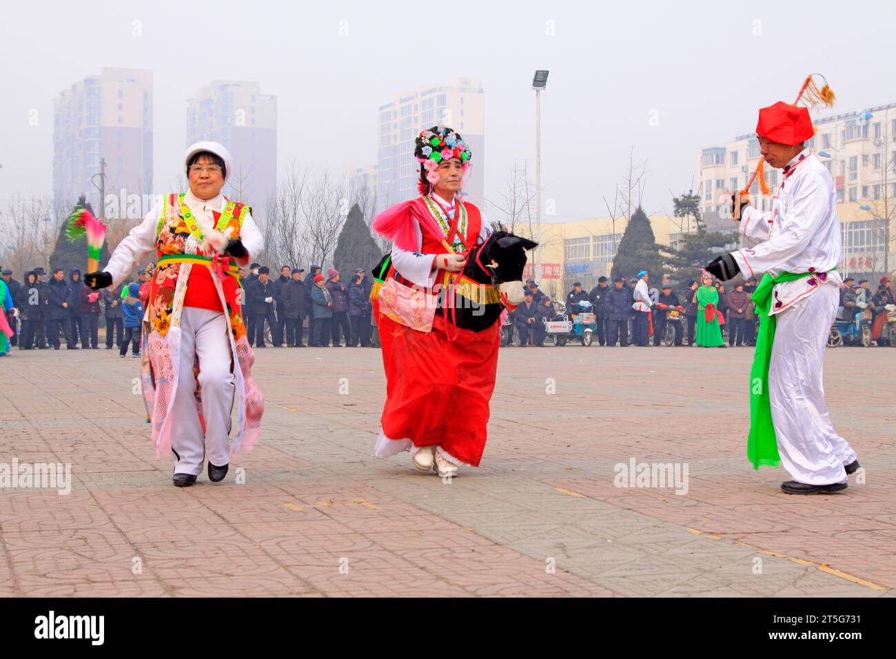 LUANNAN COUNTY - FEBRUARY 15: People wearing colorful clothes ...