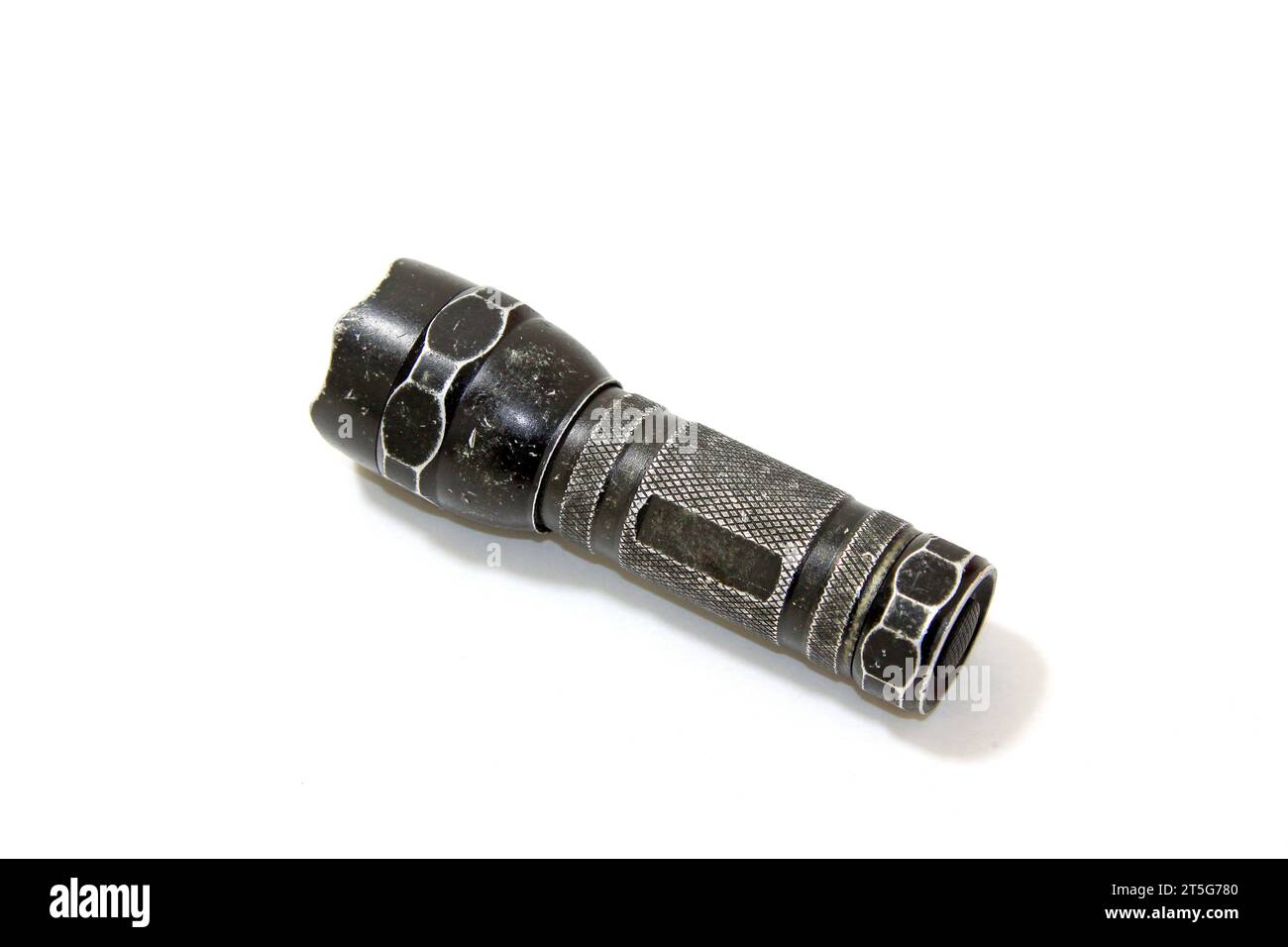 Old-fashioned pocket flashlight on a white background Stock Photo - Alamy