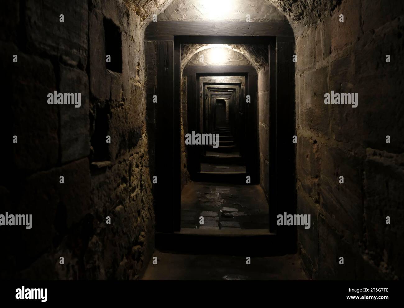 Inside the dark medieval prison of the city of Nuremberg, Germany Stock ...