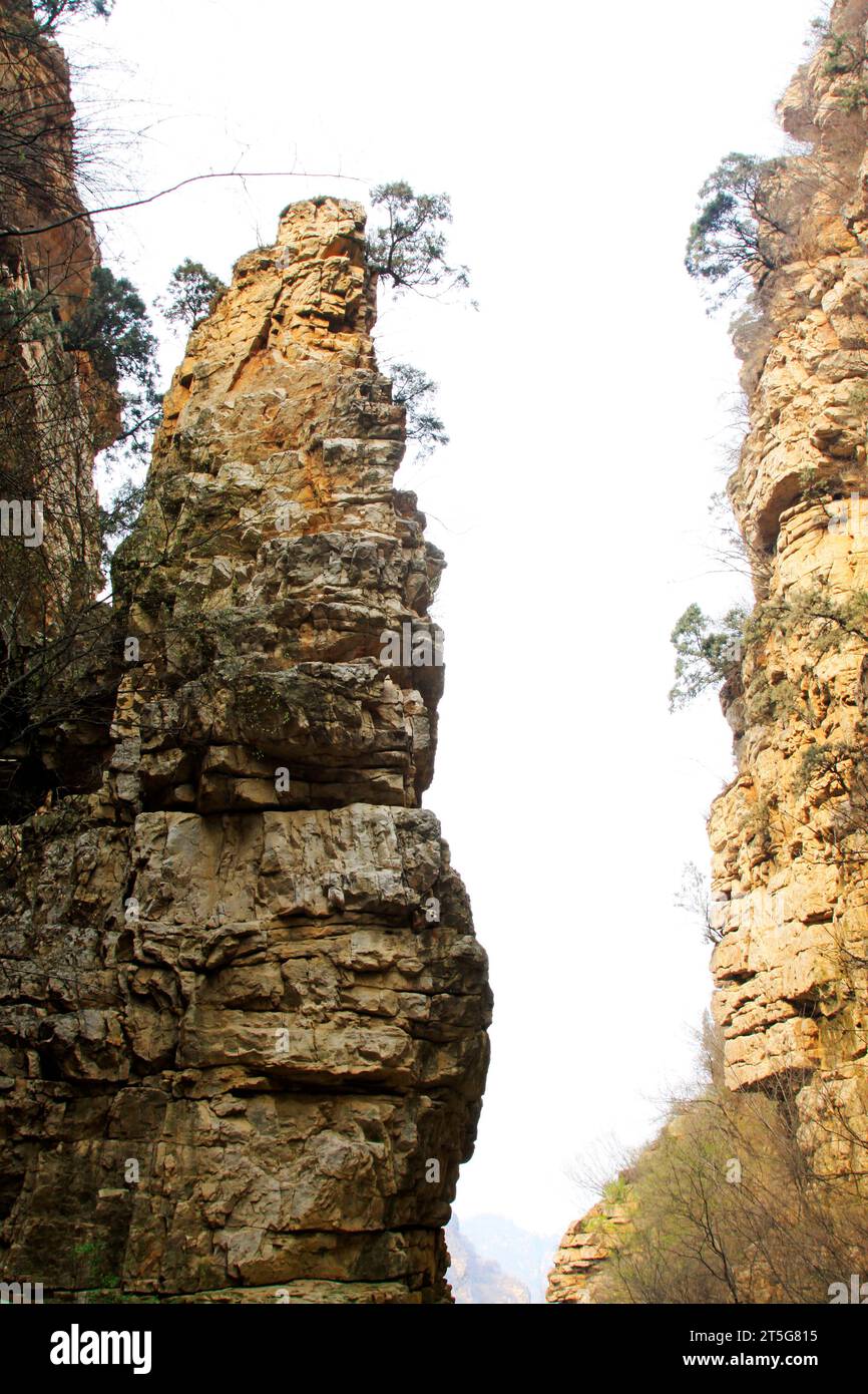 PINGGU COUNTY - APRIL 12: Sandstone butte, fairy tower, stone forest ...