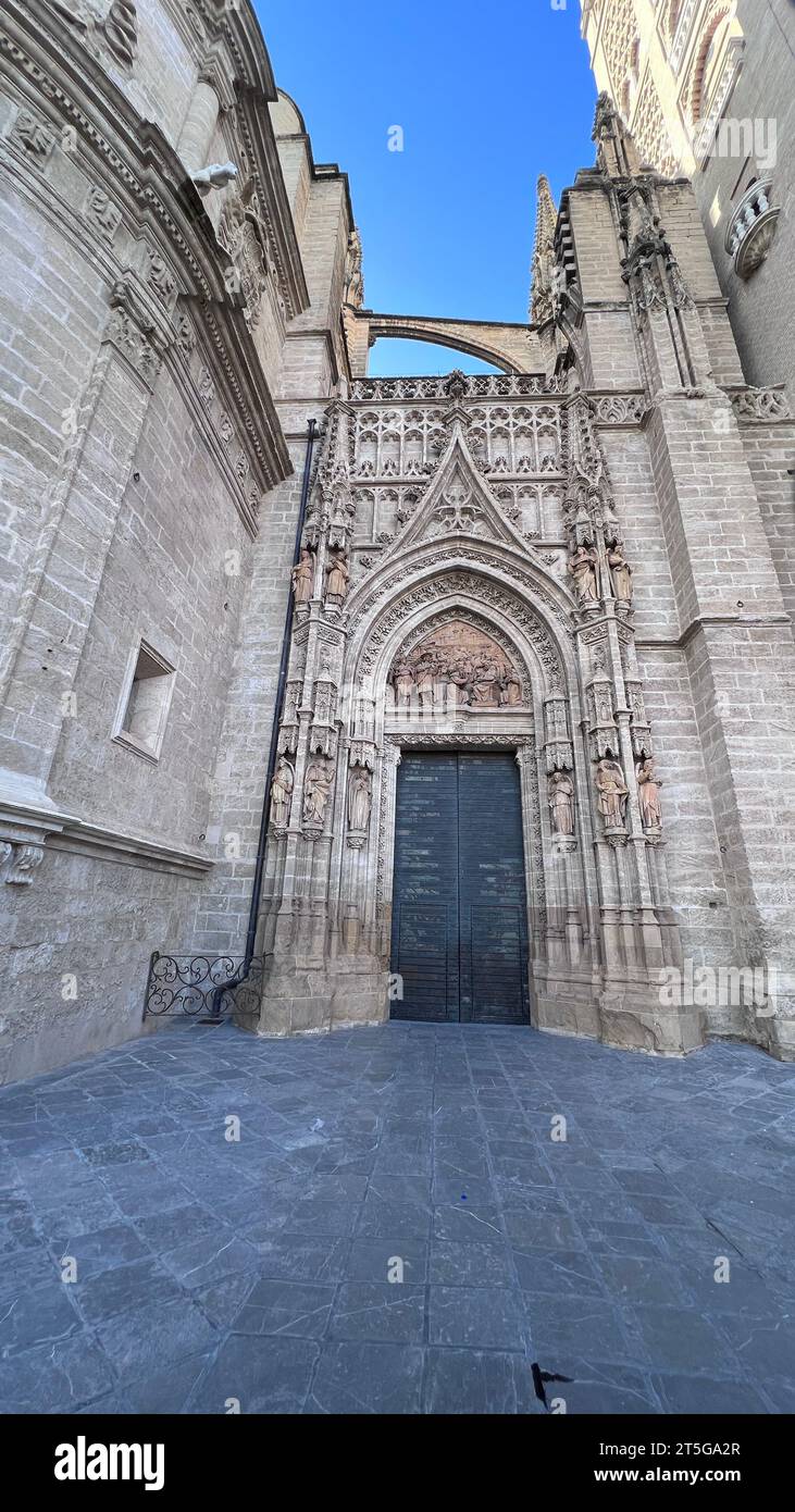 Campanillas Door of Seville Cathedral Stock Photo - Alamy