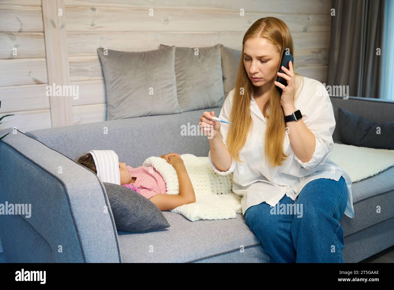 Confused with high body temperature mother calling emergency service ...