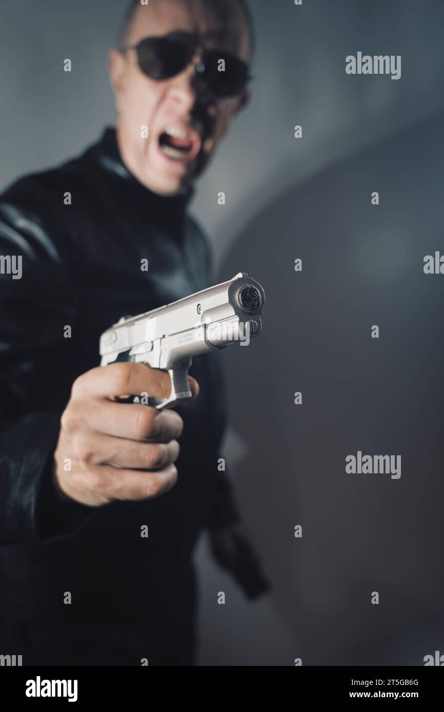 Black leather jacket hitman detective spy murderer assasin with gun ...