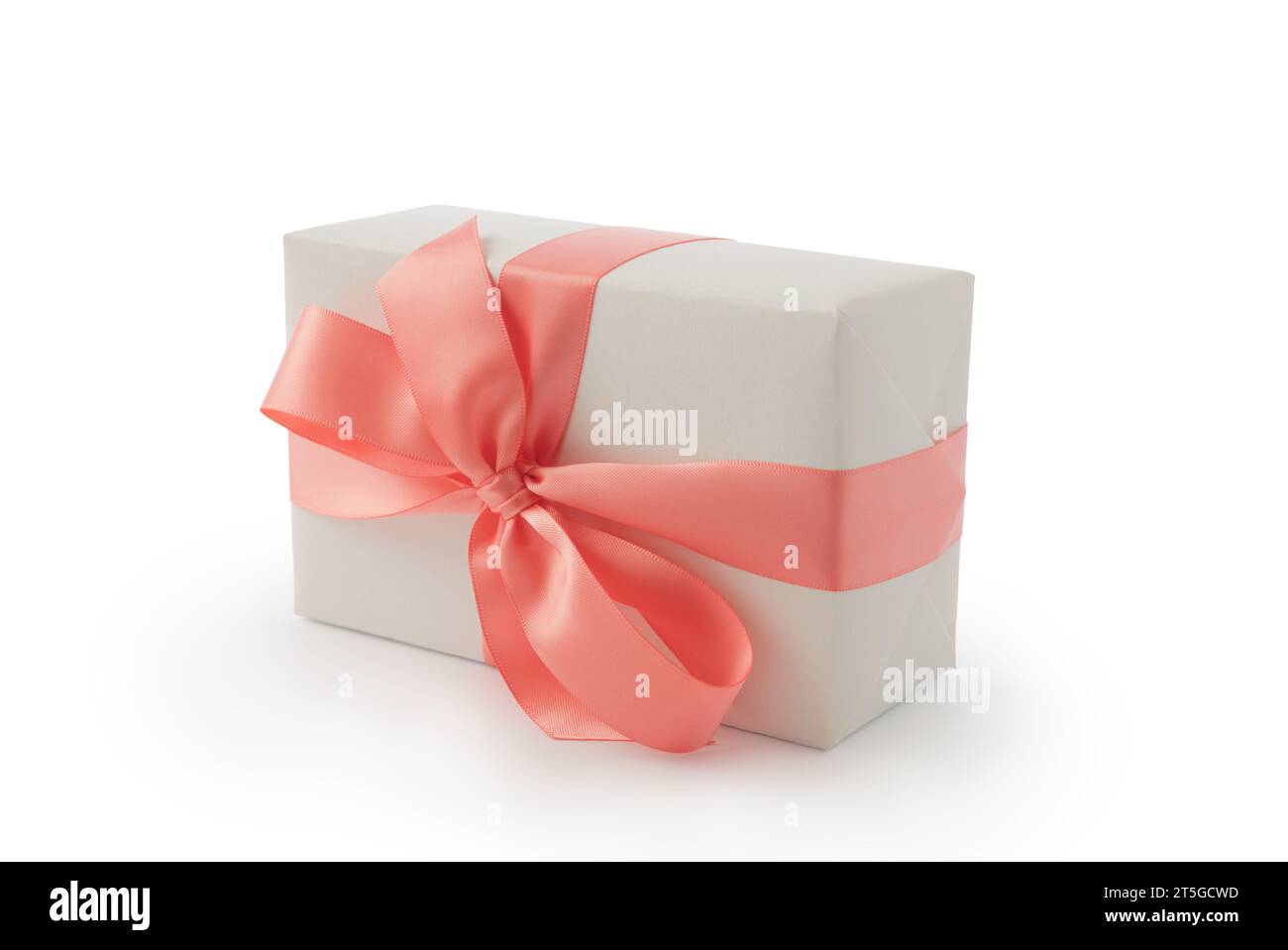 White gift box with peach color ribbon isolated on white background ...