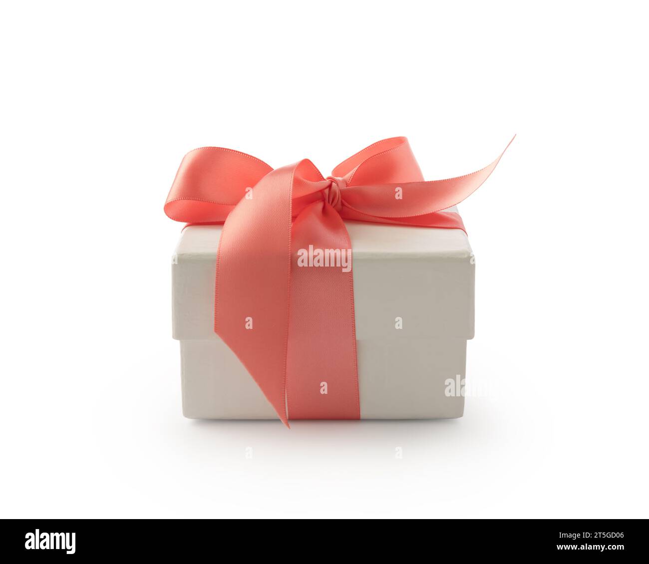 White gift box with peach color ribbon isolated on white background ...
