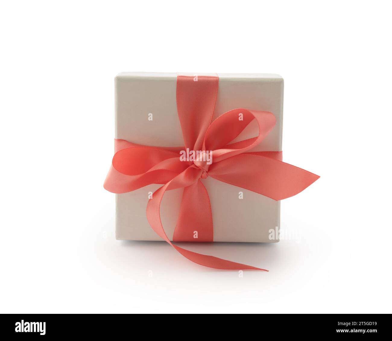 White gift box with peach color ribbon isolated on white background ...