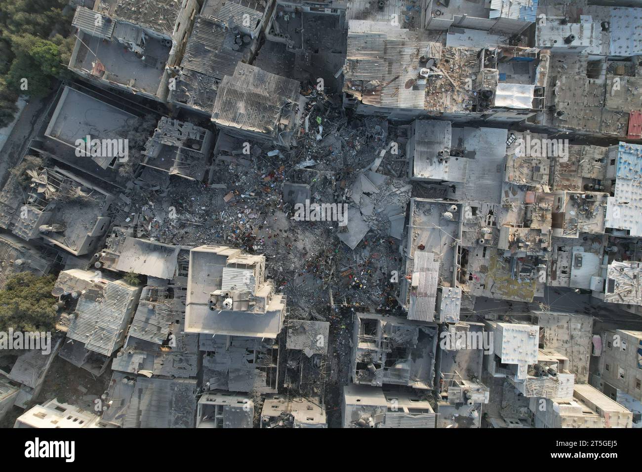 An aerial view of locals conducting search and rescue operations in the ...