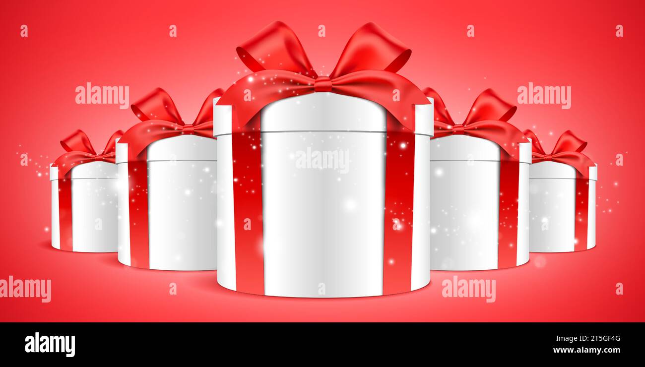 Bunch of round white gift boxes with ribbons and glitter flare standing ...