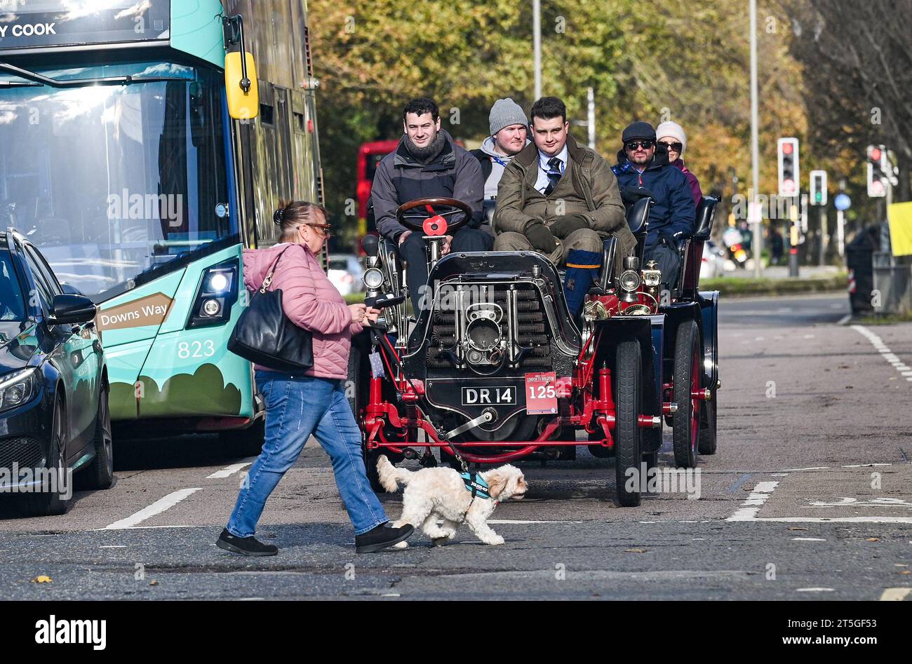 Brighton UK 5th November 2023 - Passengers in a 1902 M.M.C. are closely ...