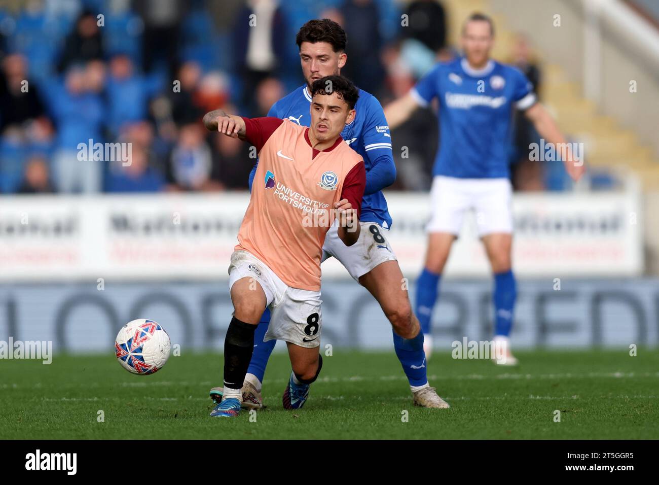 Portsmouth's Alex Robertson (left) and Chesterfield's Darren Oldaker ...