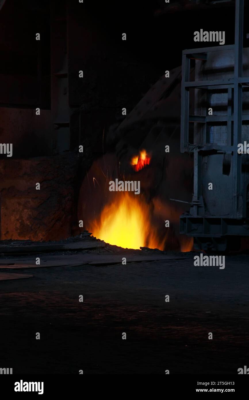 red hot molten steel in a iron and steel enterprise production scene ...
