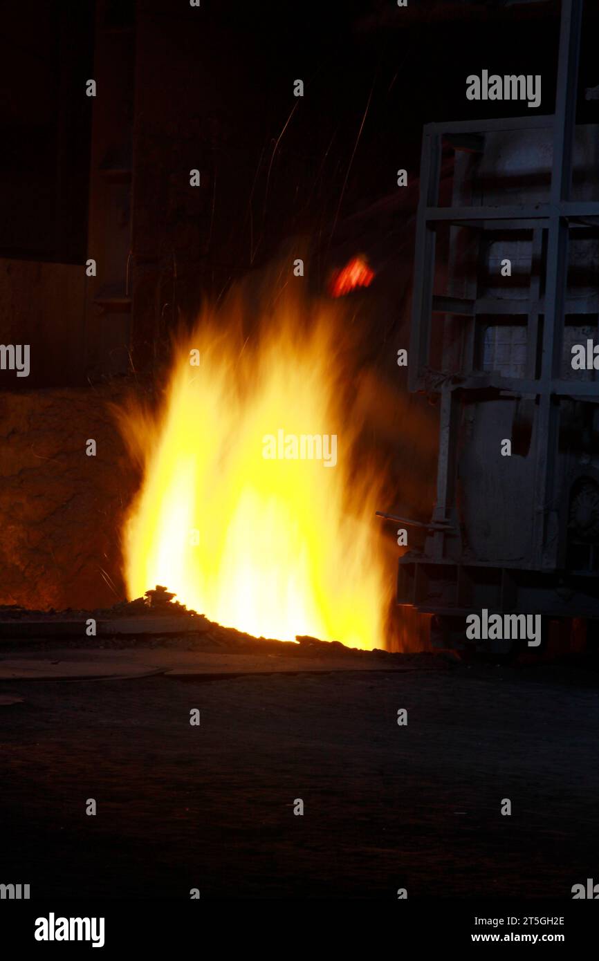 red hot molten steel in a iron and steel enterprise production scene ...