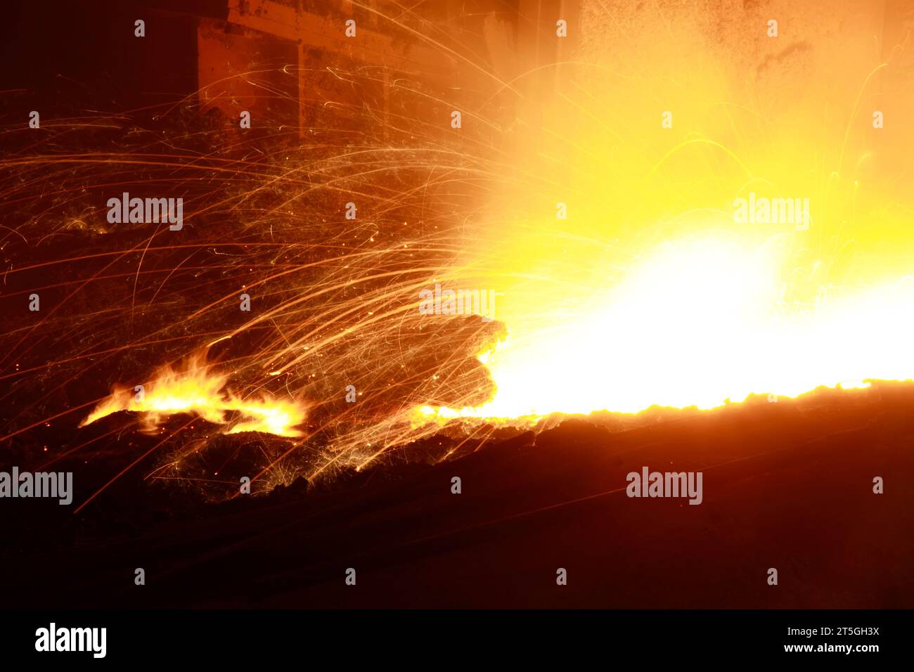 hot molten steel splash in a factory Stock Photo - Alamy