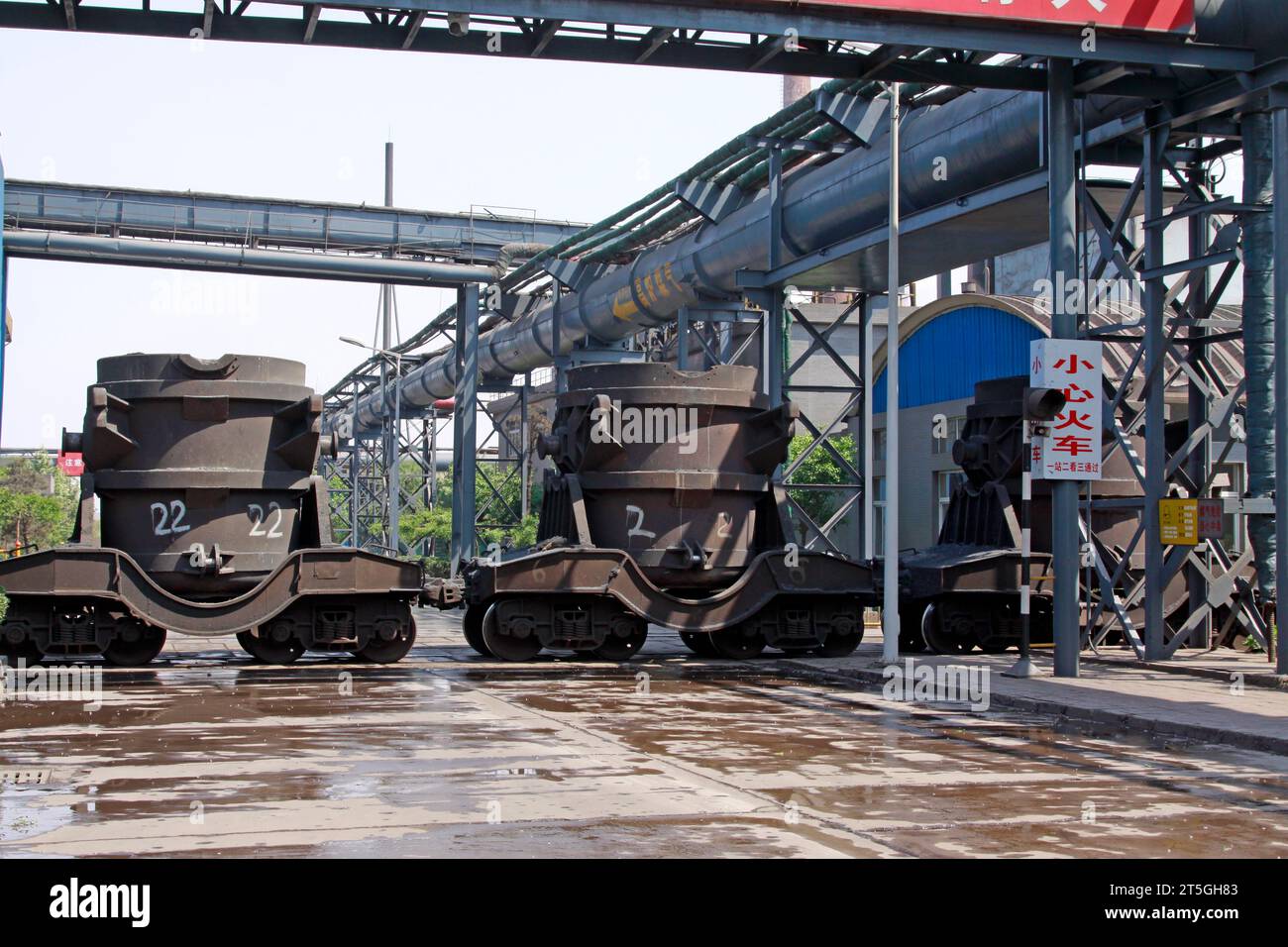 hot metal transport vehicles in a factory, closeup of photo Stock Photo ...