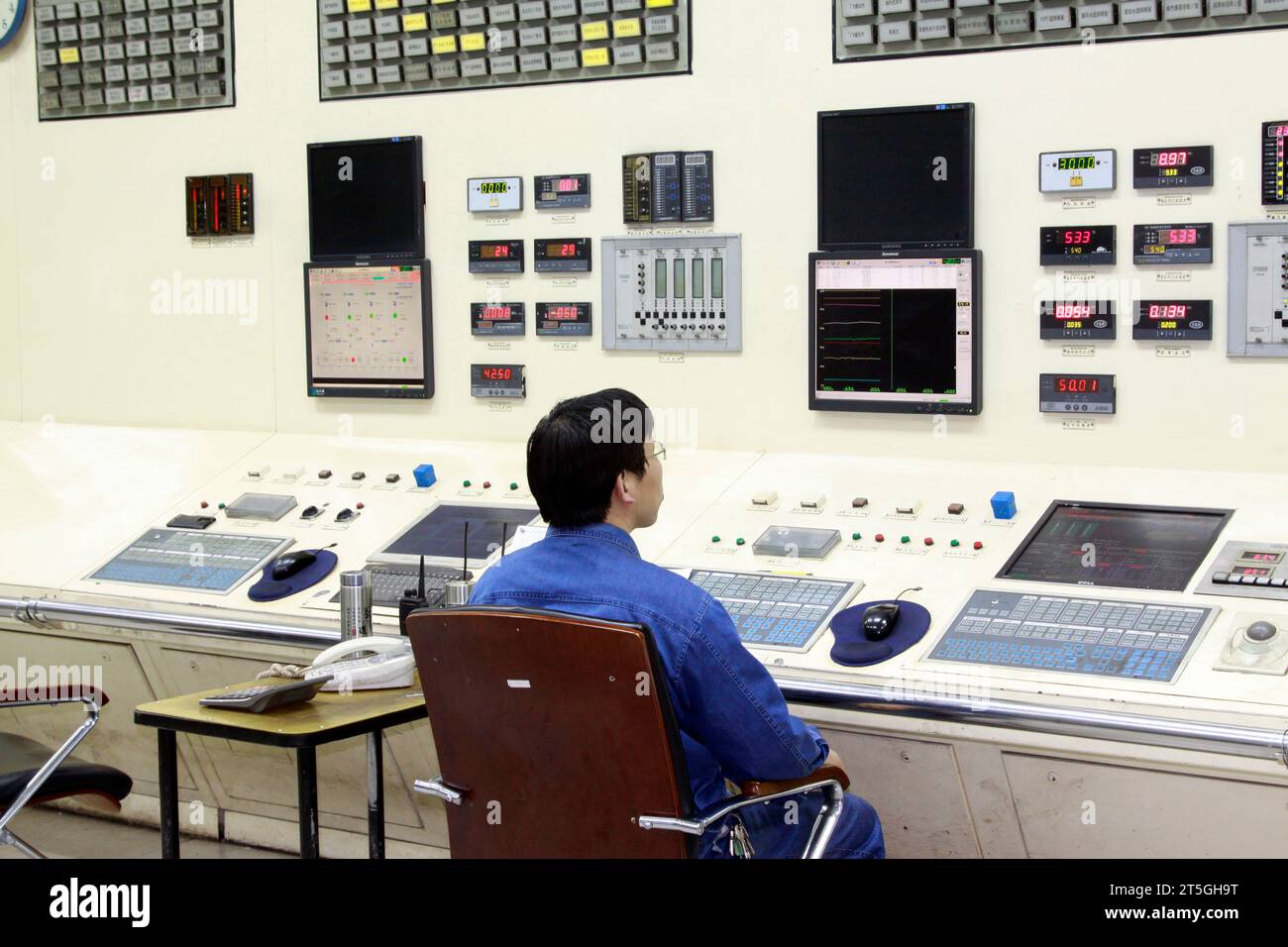 LUANNAN - MAY 4: Technical personnel in the monitor equipment operation ...