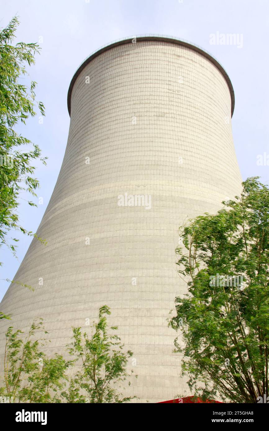 heavy industrial water cooling tower and the green tree, north china ...