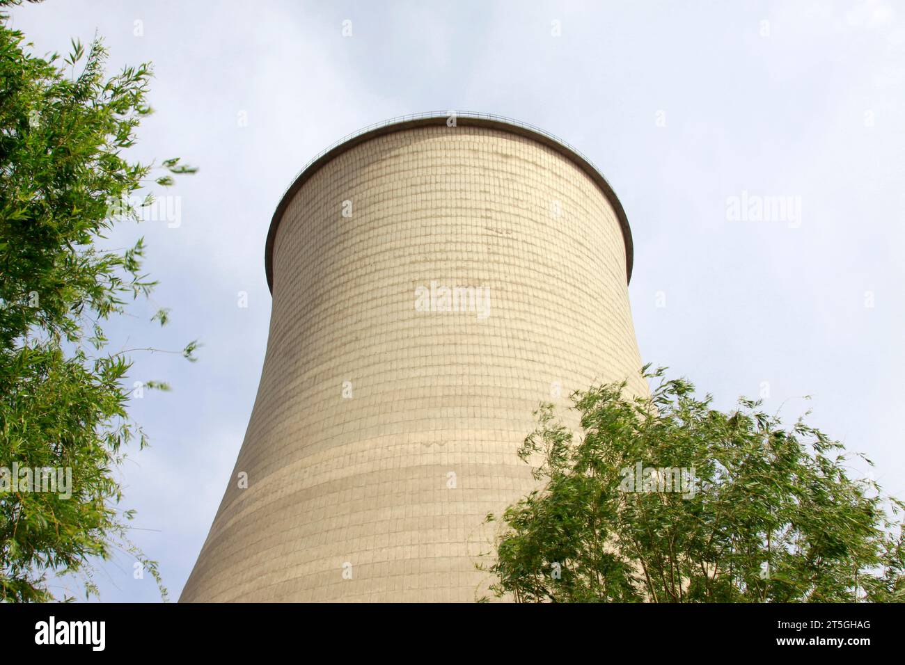 heavy industrial water cooling tower and the green tree, north china ...