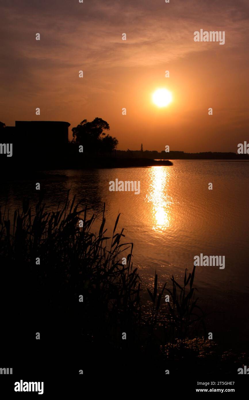water surface in the sunset, quiet environment Stock Photo - Alamy