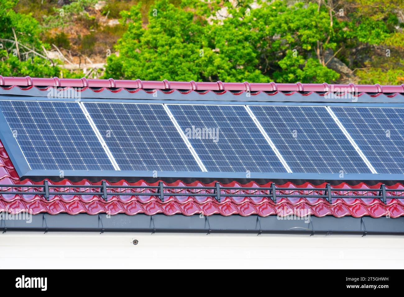 Solar panels on a garage roof Stock Photo - Alamy