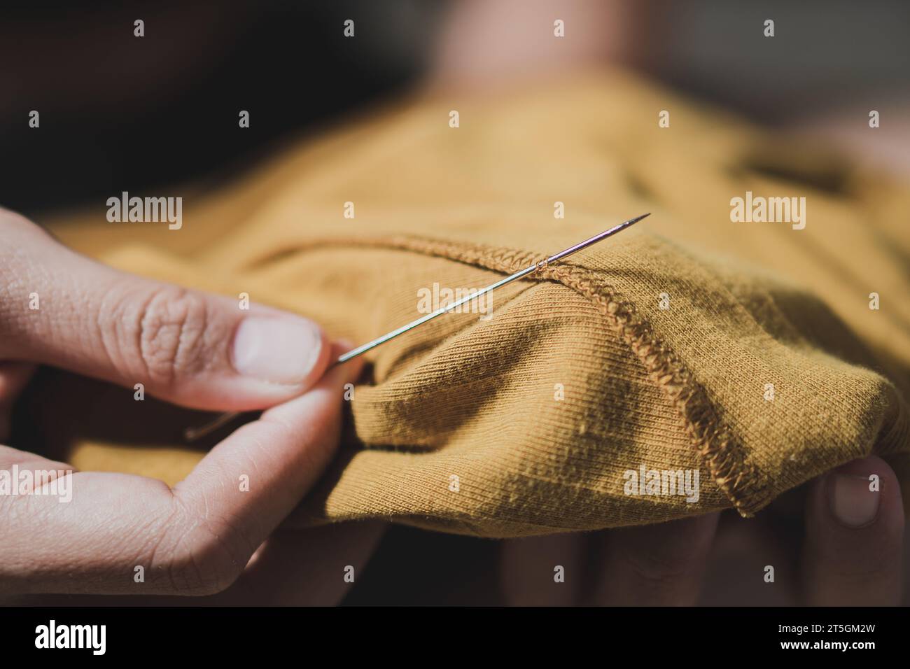 Threading needle hi-res stock photography and images - Alamy