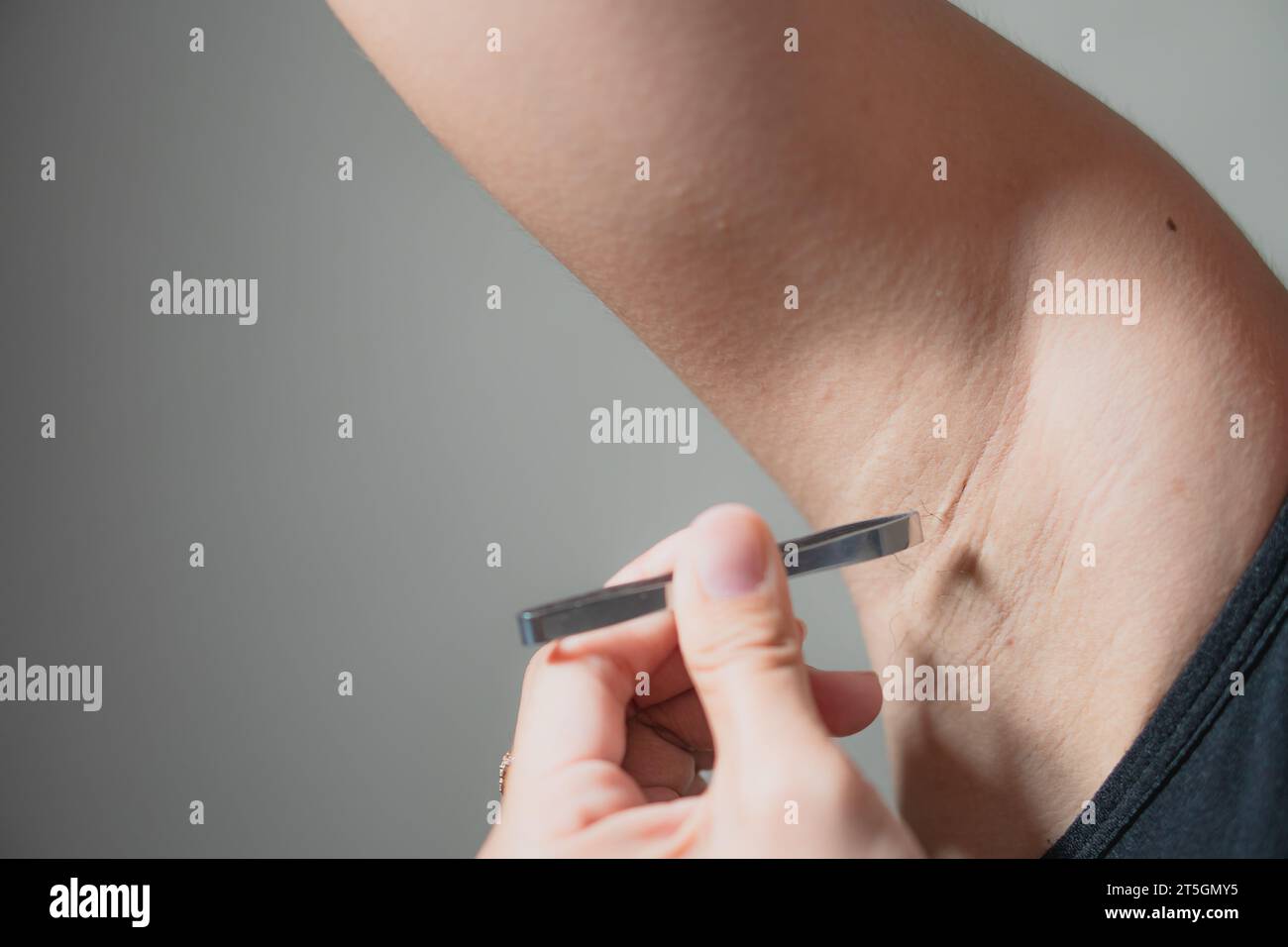 Female hairy armpit hi-res stock photography and images - Alamy