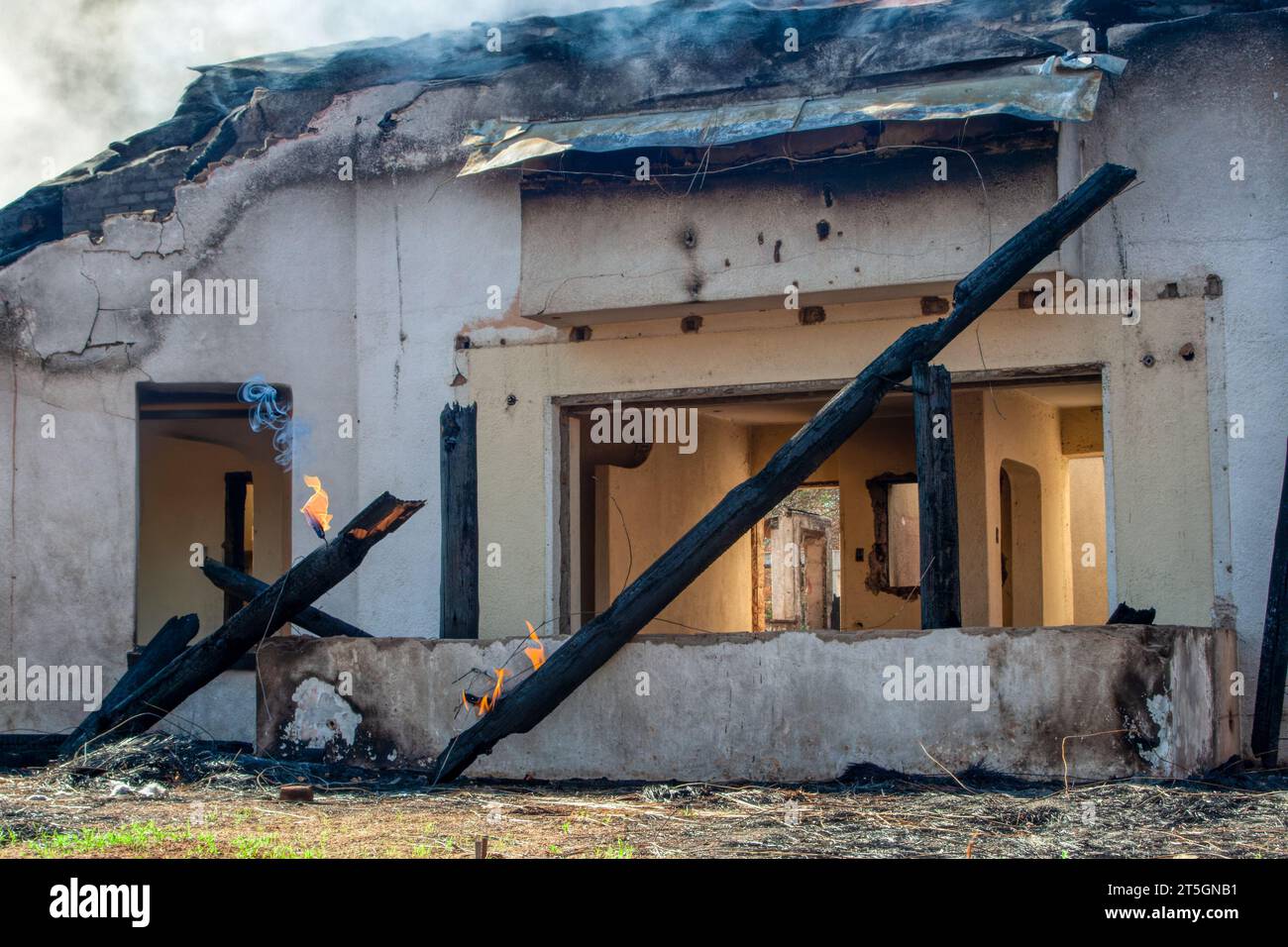 burned down house, destruction, flames and smoke, no insurance Stock ...