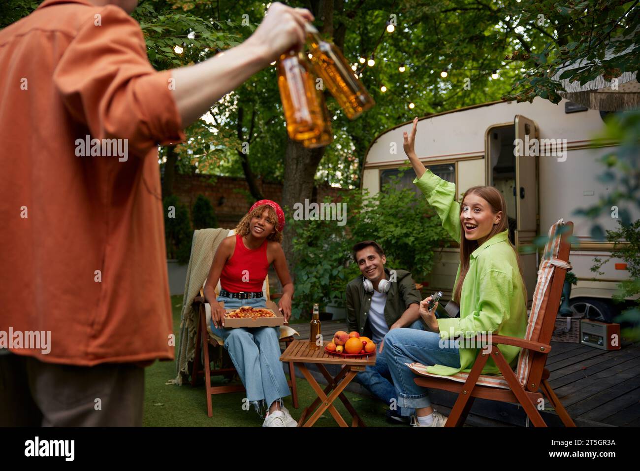 Young friends camping in the wilderness hi-res stock photography and ...