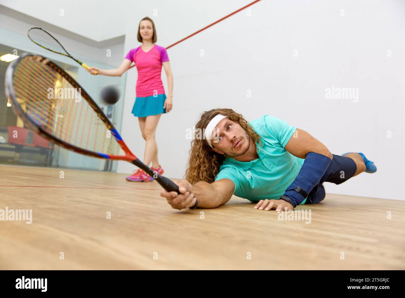 Playing squash hi-res stock photography and images - Alamy