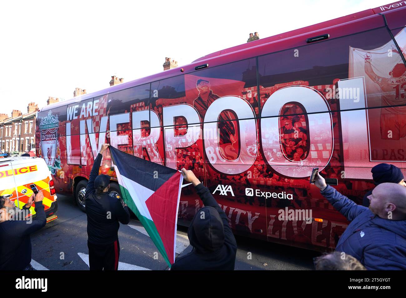 The flag of Palestine is held up by members of the public outside the ...