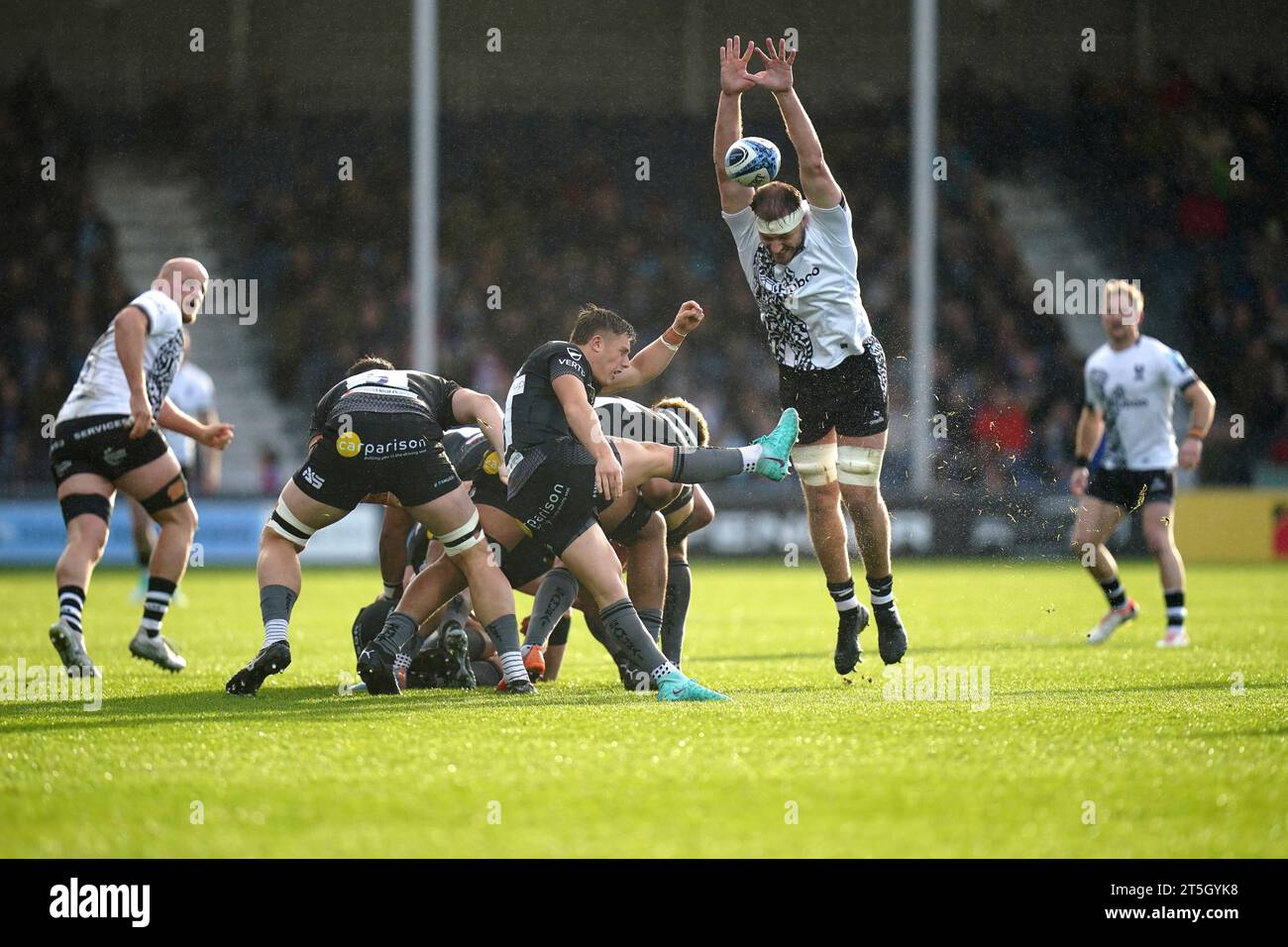 Exeter Chiefs' Tom Cairns clears the ball under pressure during the ...