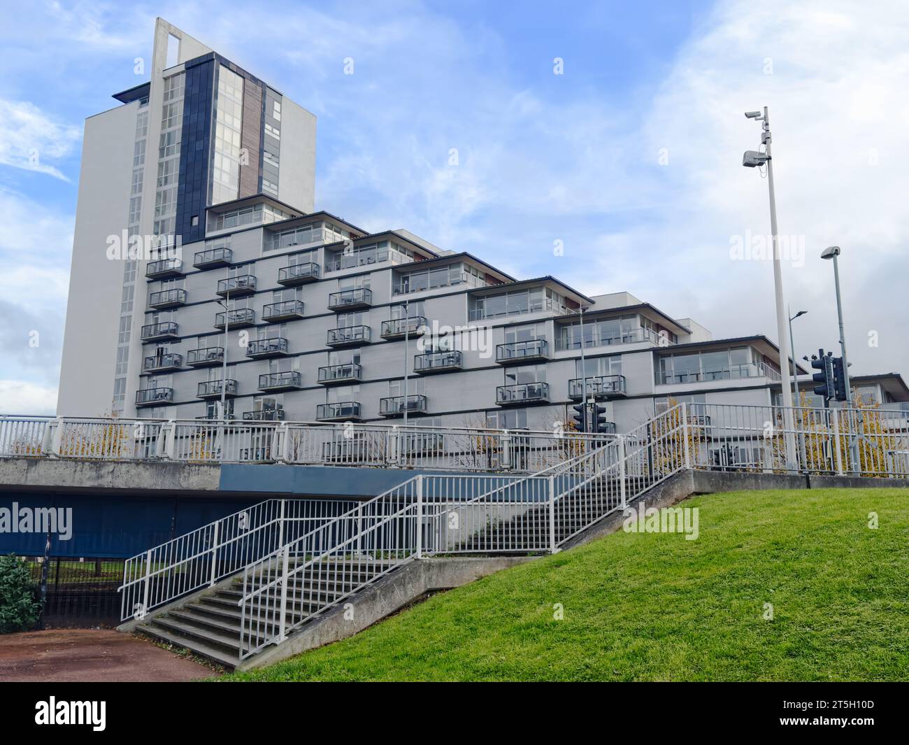 Modern high rise flats at new development on waterfront Stock Photo - Alamy