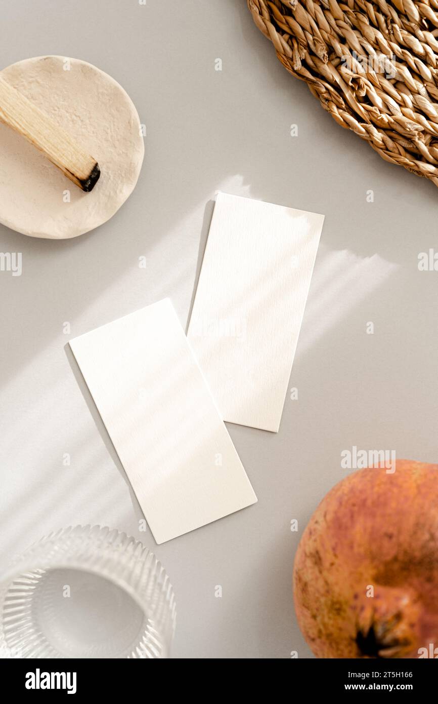 Flat lay of two blank cards sheet on aesthetic pastel grey background ...