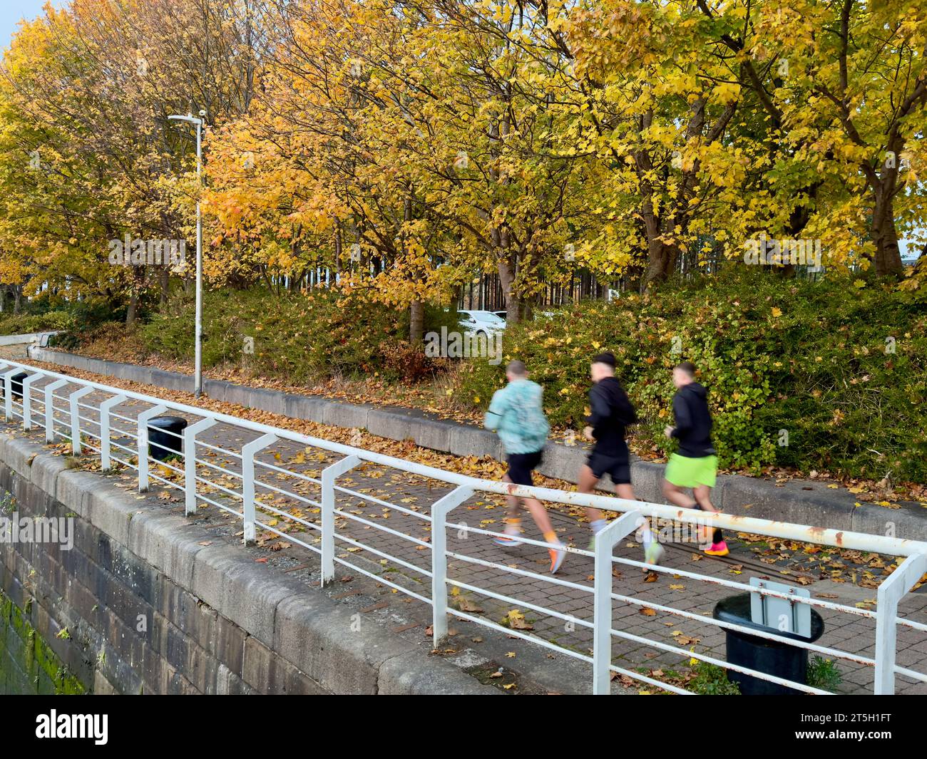 Three men running in marathon hi-res stock photography and images - Alamy
