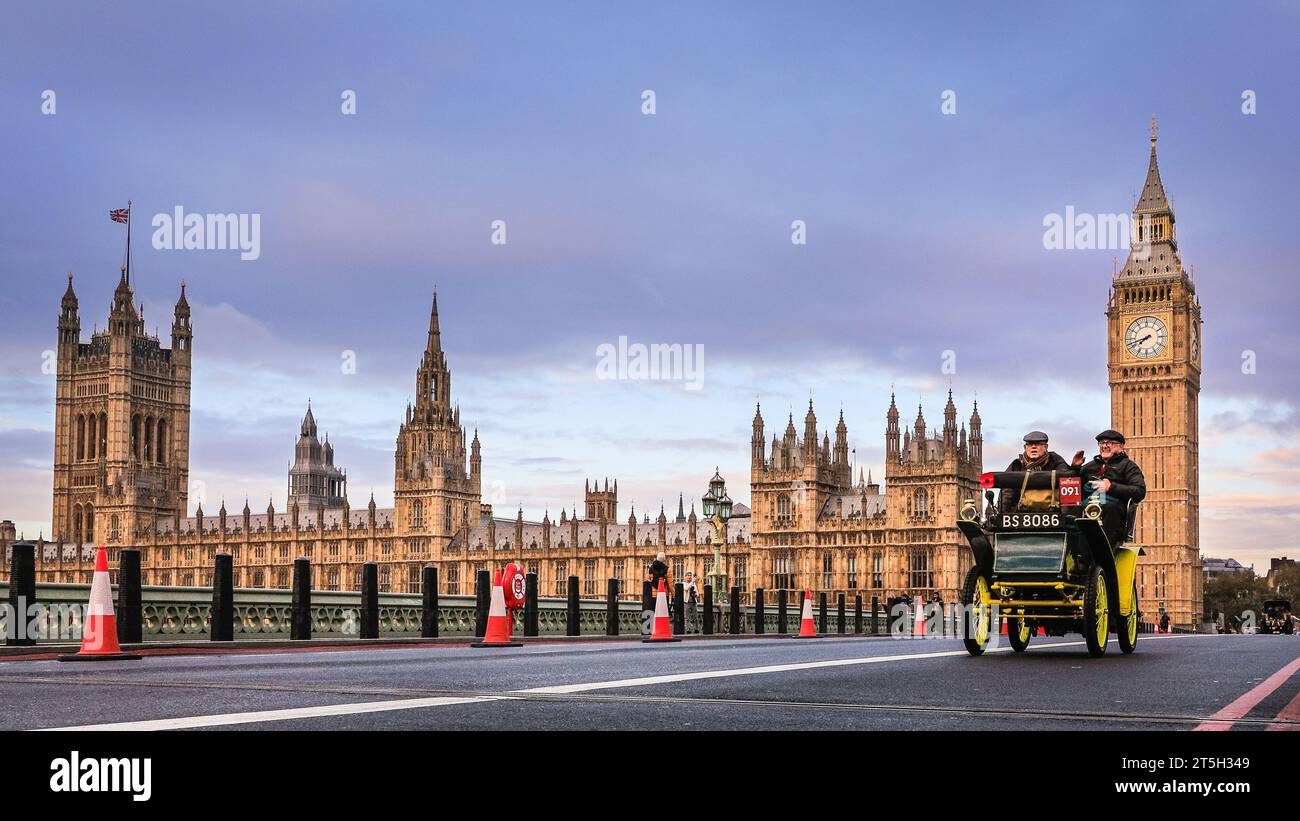 London, UK 05th Nov 2023. A 1902 Rochet on Westminster Bridge with the ...