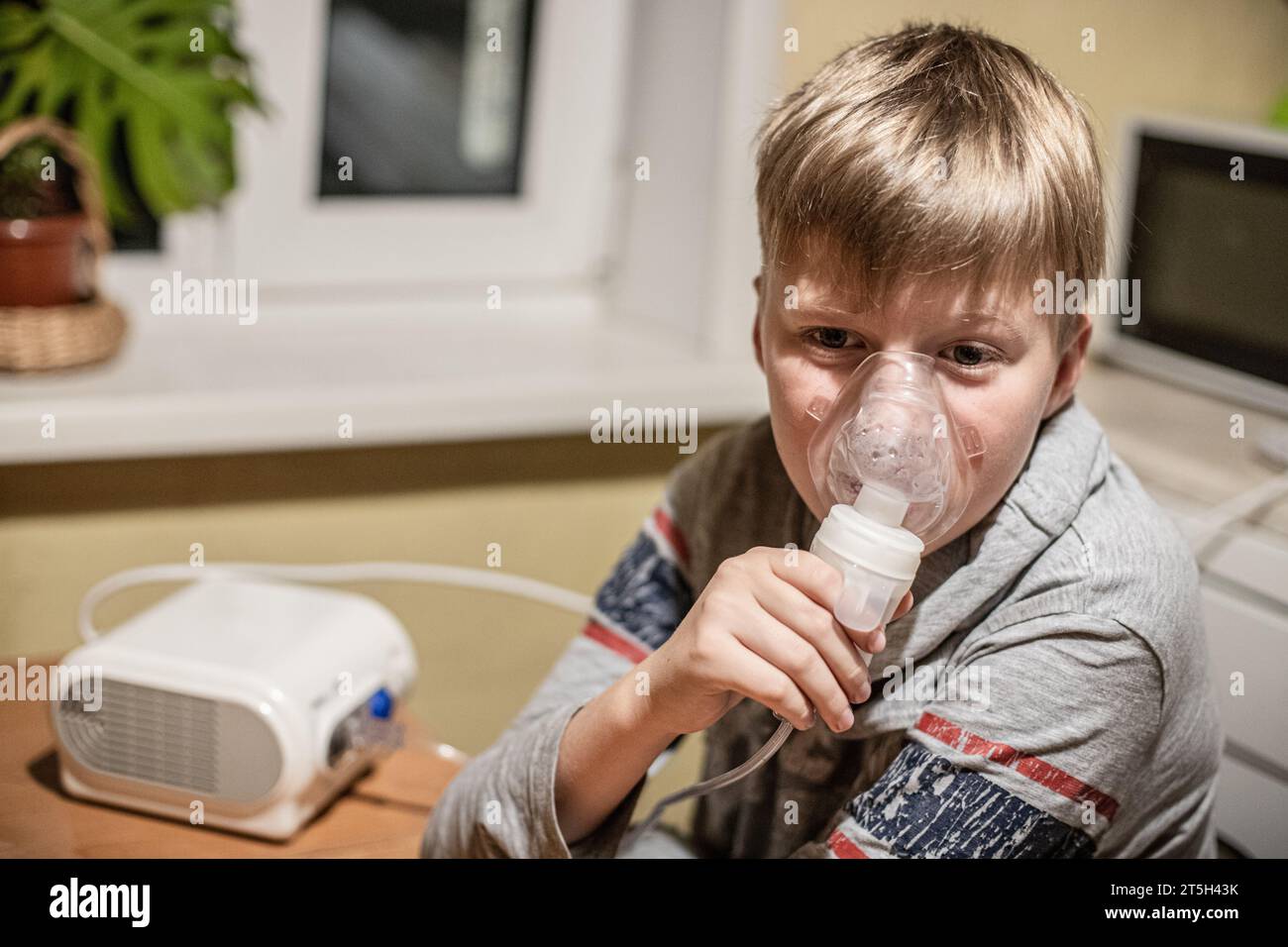 Asthma COPD Breath Nebulizer And Mask is used by a boy at home Given By ...