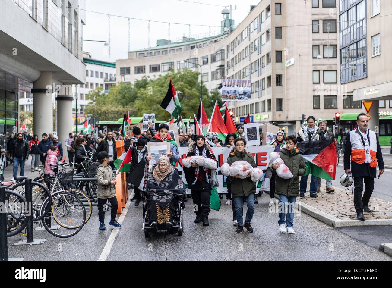 A pro-Palestinian protest calling for ceasefire while walking through ...