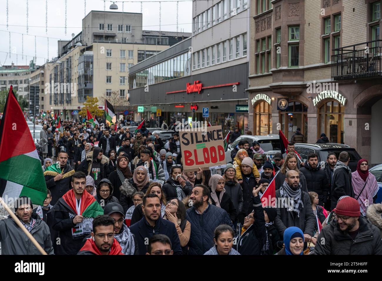A pro-Palestinian protest calling for ceasefire while walking through ...