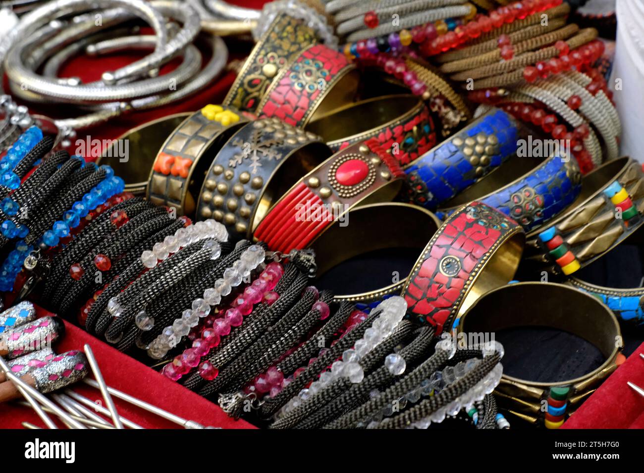 Indian bangles displayed in local shop in a market of Pune, India ...