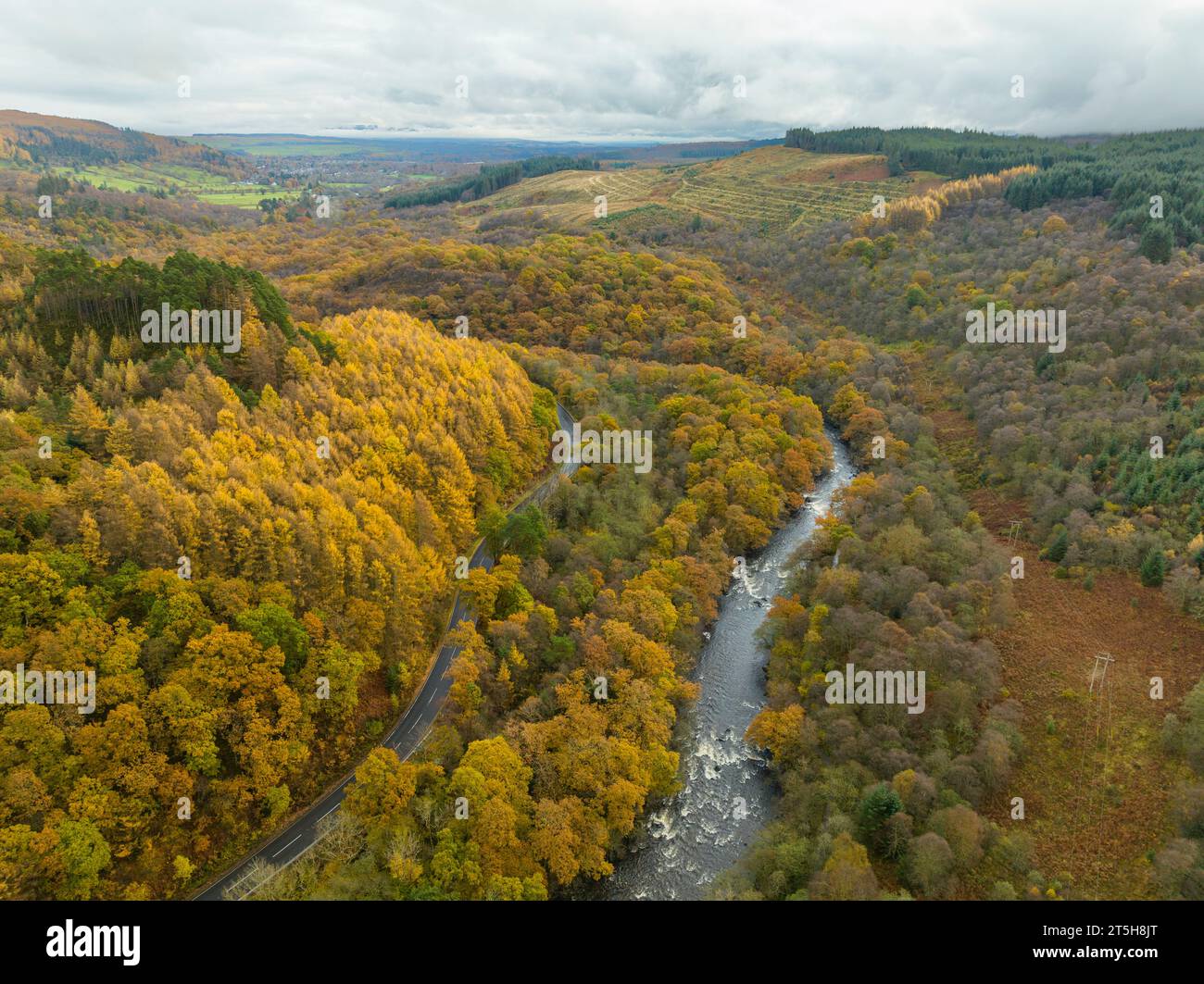 Aerial view of autumn colours beside the Garbh Uisge river in the Pass ...